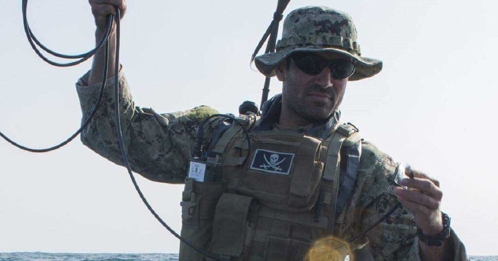 A civilian mariner’s leg was severed. This sailor helped save his life